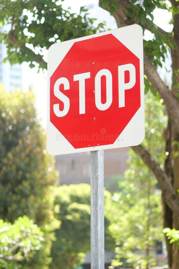 Stop Sign Logo on a Empty Road Stock Photo - Image of warning, signal ...