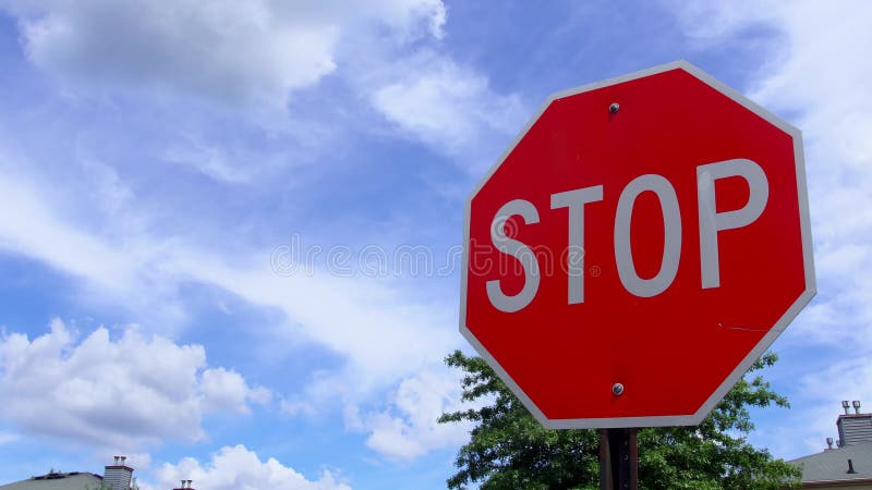 Stop Sign with Fast Moving Clouds Stock Footage - Video of blue ...