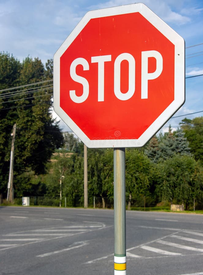 Stop Sign in Front of an Intersection Stock Photo - Image of halt ...