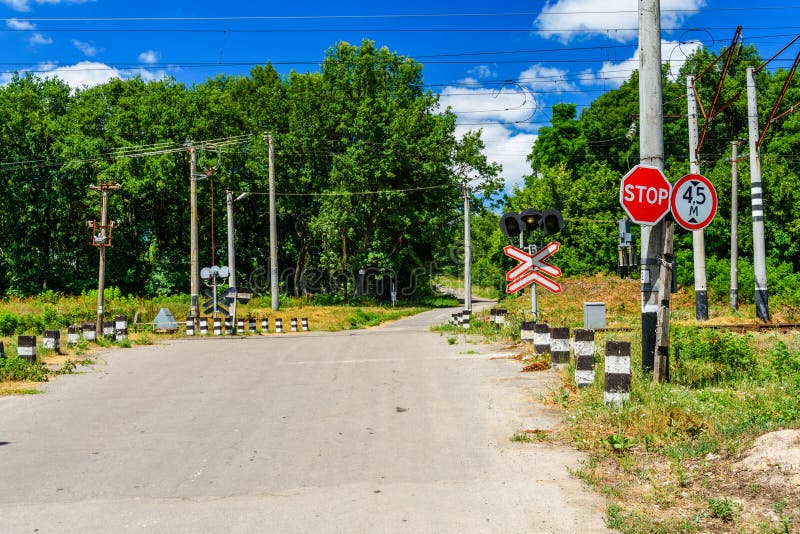 Stop Sign in Front of the Railroad Crossing Stock Image - Image of pole ...