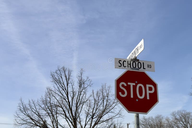 Stop Sign at the Intersection in Front of the School Stock Photo ...