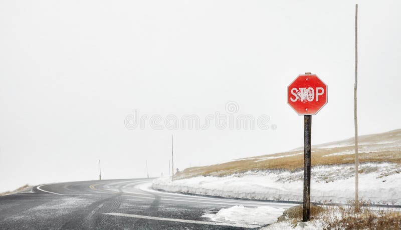 Stop Sign at a Mountain Roads Intersection during Blizzard, Selective ...