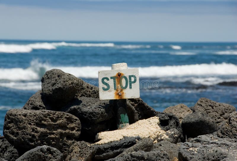 Stop sign near the ocean stock image. Image of ocean - 26815535