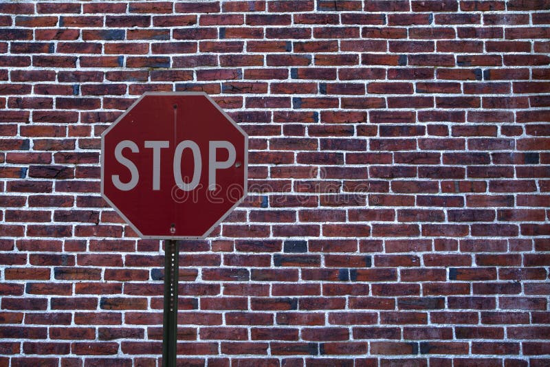 Stopsign on a Brick Stone Road Stock Image - Image of cars, city: 111247277