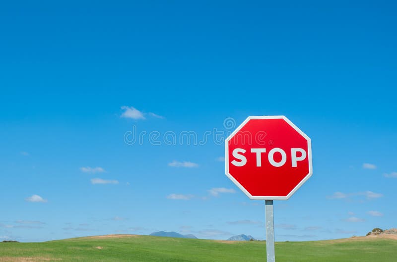 Stop Sign Over Blue Sky Background Stock Photo - Image of white, design ...