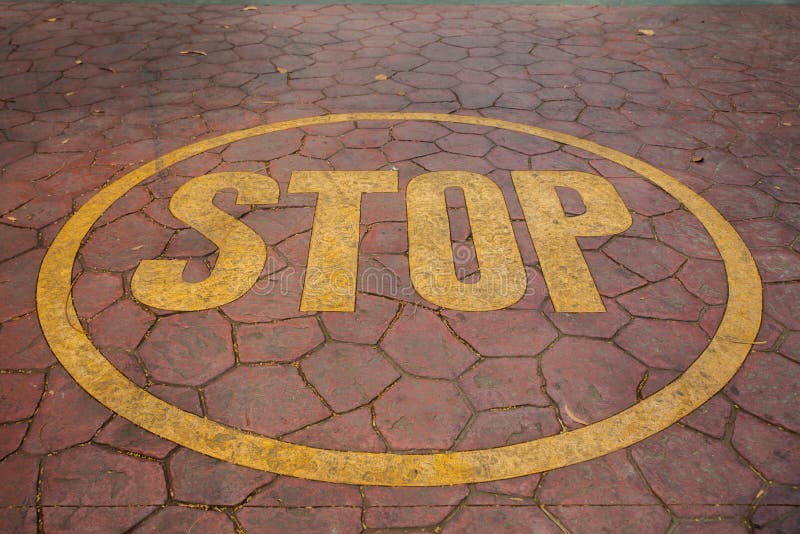 Stop sign painted on floor stock photo. Image of traffic - 81791032