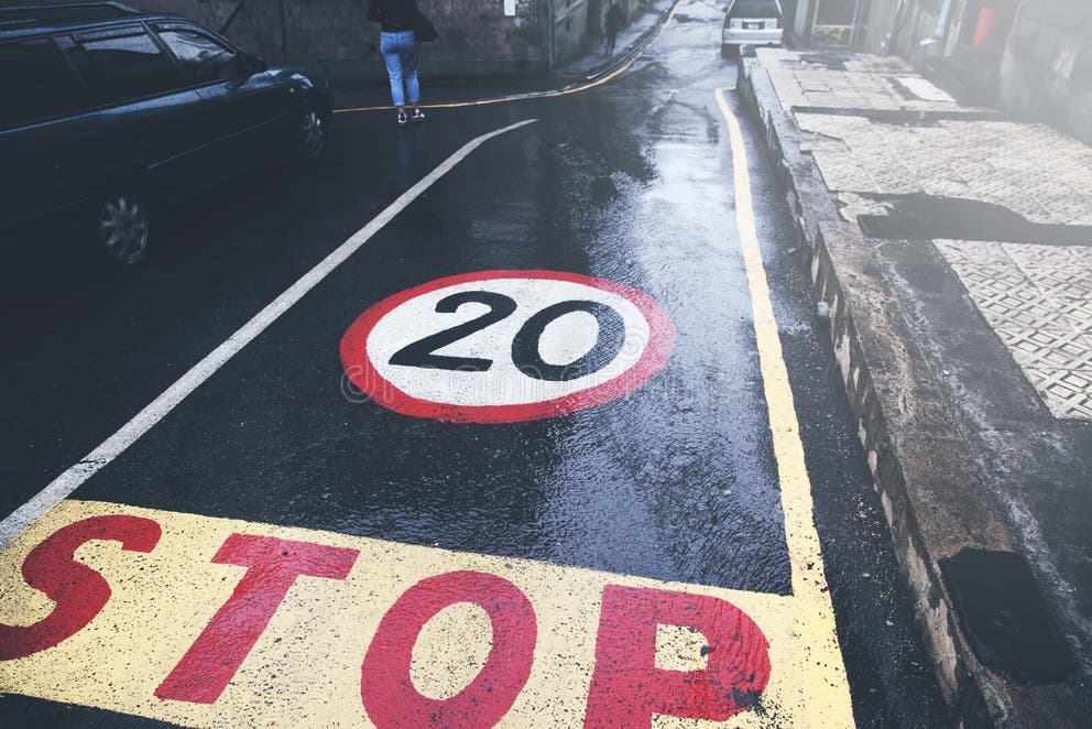 A Stop Sign Painted on the Road Stock Photo - Image of drive, asphalt ...