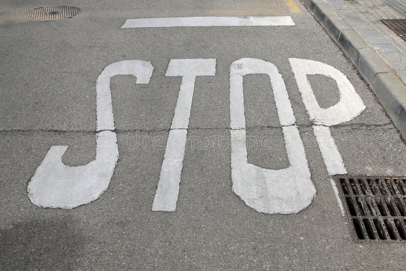 Stop Painted on Road stock photo. Image of road, marking - 12265660