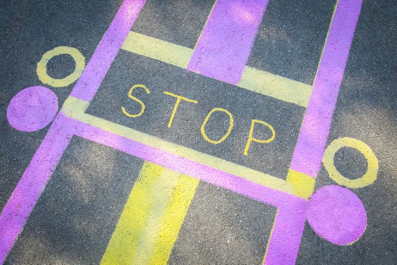 Stop sign painted on road stock image. Image of lines - 128119441