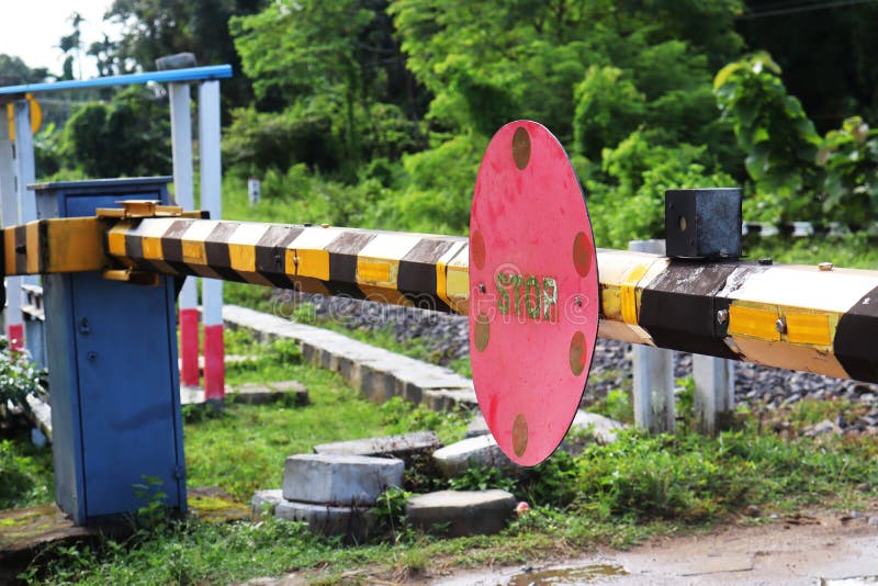 Stop Sign in a Railway Crossing Gate Stock Photo - Image of gate, road ...