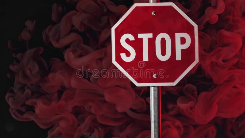 Stop Sign with Red Smoke Background, Dramatic Scene and Caution Concept ...