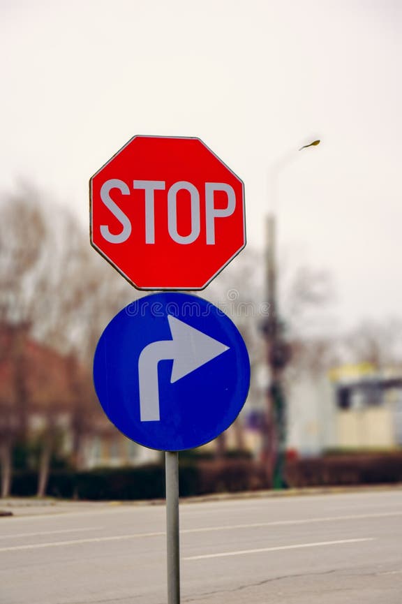 Stop Sign and Right Turn Sign in Traffic Stock Photo - Image of drive ...
