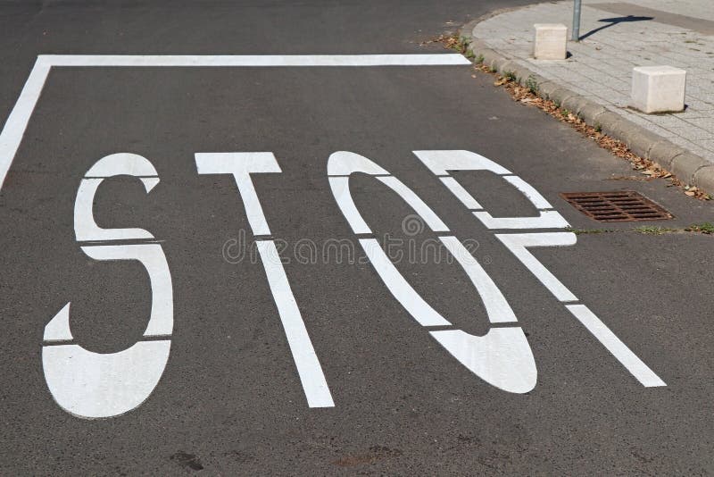 Stop Sign in the Road Crossing Stock Image - Image of stop, crossing ...