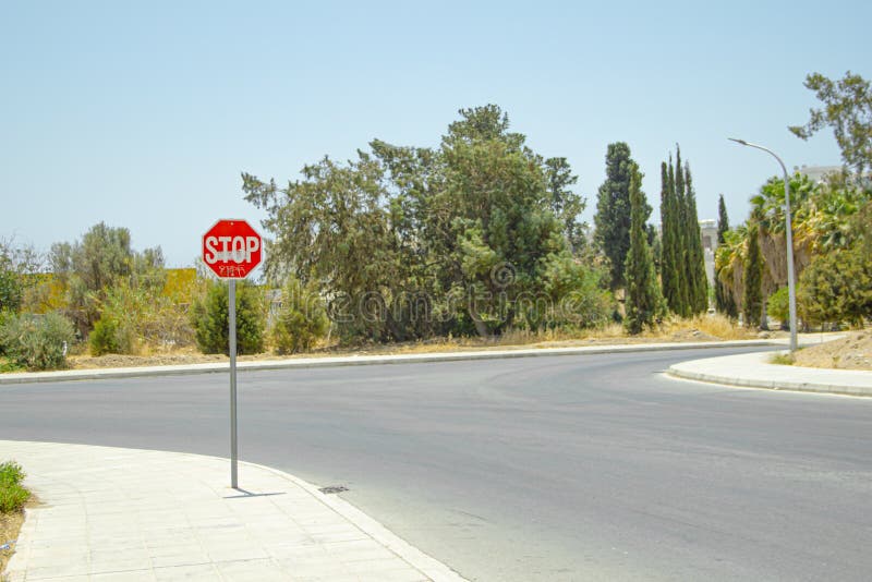Stop sign on the road stock photo. Image of streetlight - 222429762