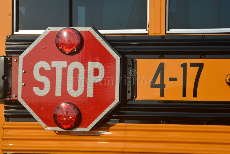 Stop Sign on the Side of a School Bus Stock Photo - Image of carwash ...