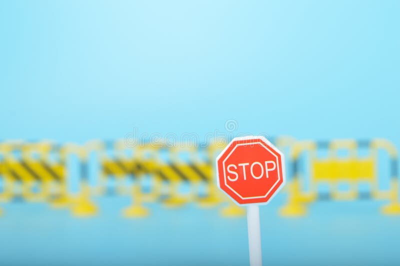 Stop Sign Symbol Isolated on a Blue Background Stock Photo - Image of ...