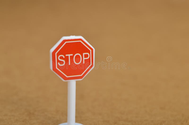 Traffic Light Toy and Stop Sign Isolated on a Blue Background Stock ...