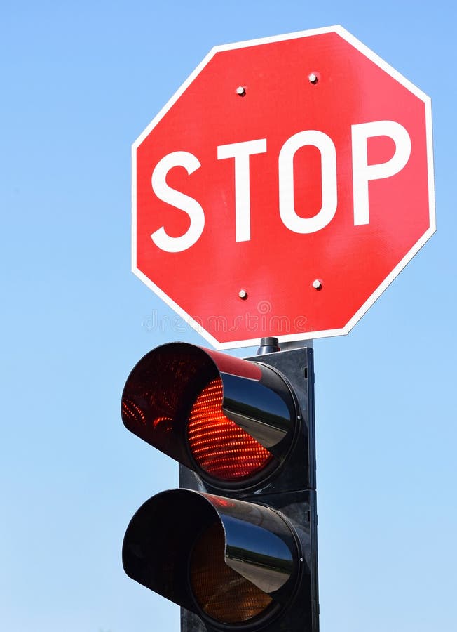 Stop Sign and Traffic Lights Stock Photo - Image of light, asphalt ...