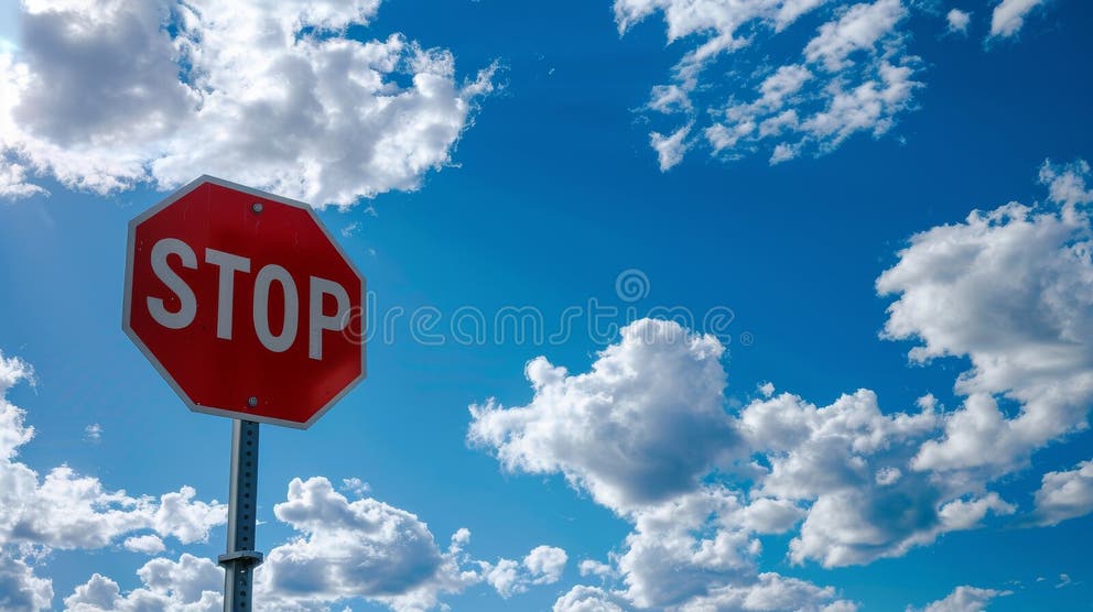 Stop Sign Under a Blue Sky with Scattered Clouds Stock Photo - Image of ...