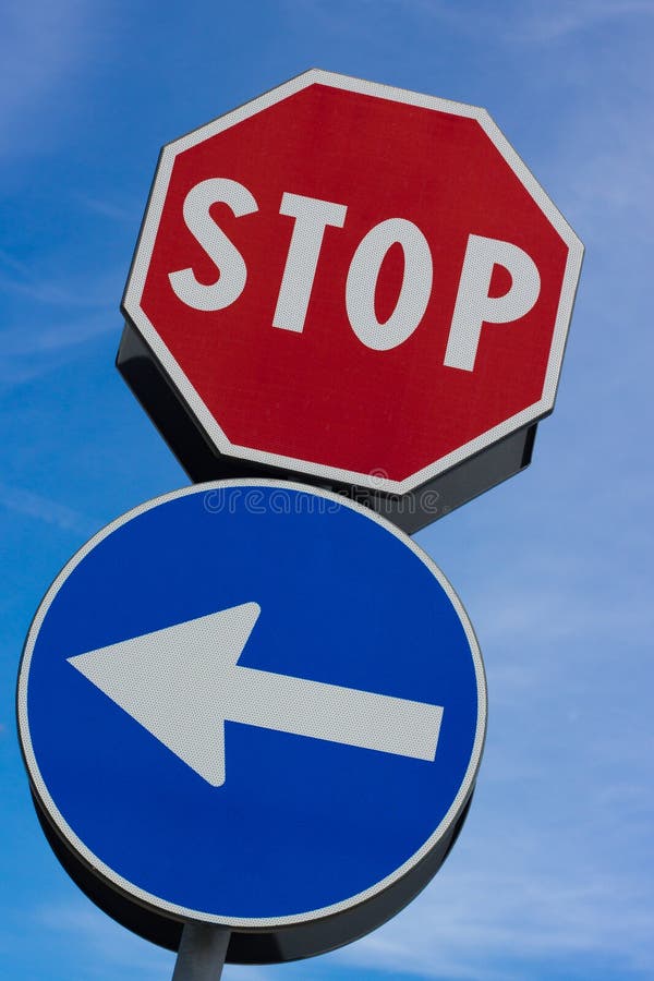 Stop Signal with Left Arrow Stock Photo - Image of sign, octagon: 25177480