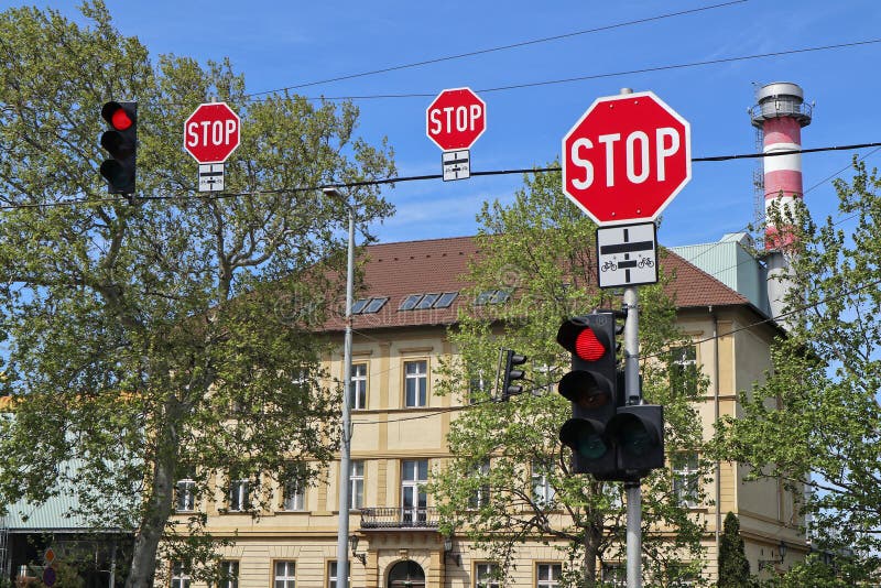Stop Signs and Red Traffic Lights Stock Image - Image of road, clear ...