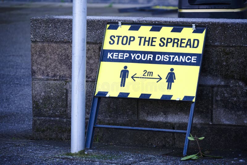 Stop the Spread Keep Your Distance Sign during the Pandemic Editorial ...