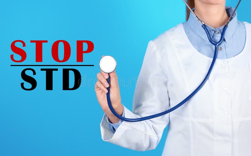 STOP STD. Doctor with Stethoscope on Light Blue Background, Closeup ...