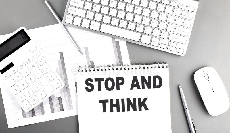 STOP and THINK Text on Notebook with Calculator , Chart and Keyboard ...