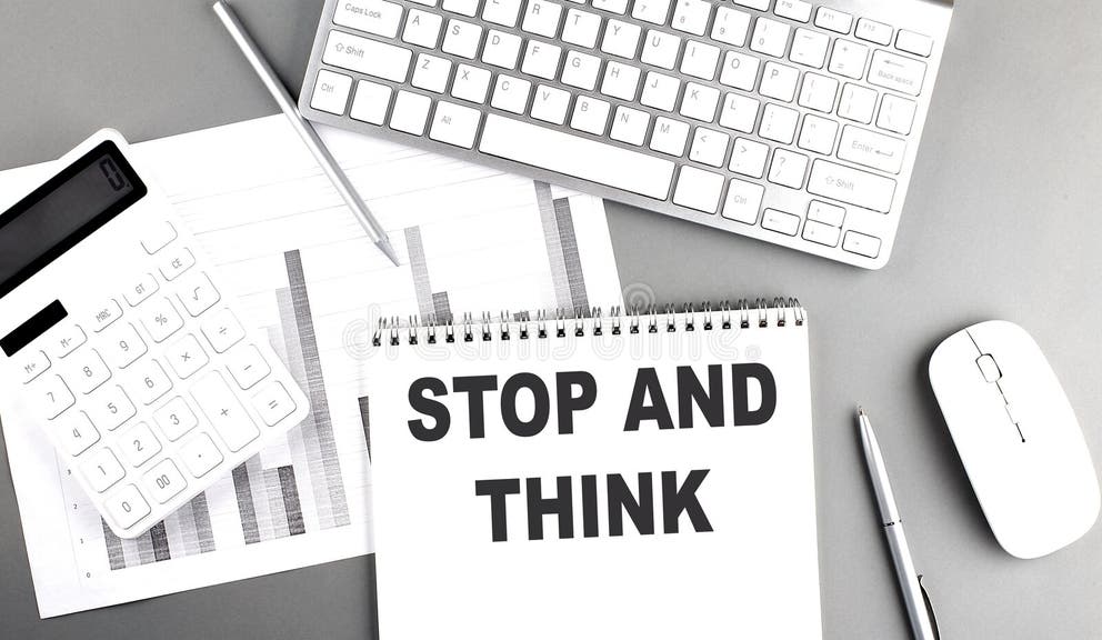 STOP and THINK Text on Notebook with Calculator , Chart and Keyboard ...