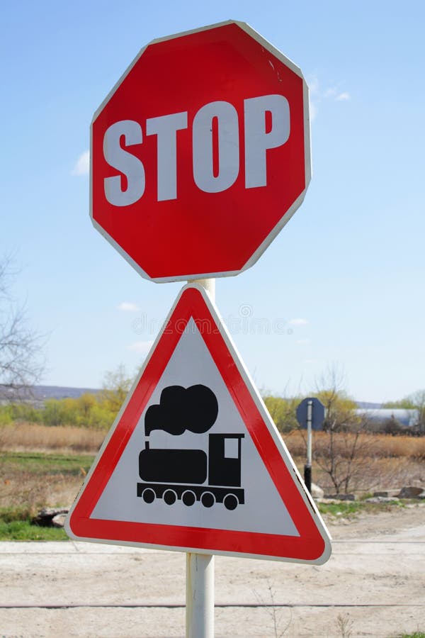 Train Warning Sign At A Railroad Crossing Stock Photo - Image of bahn ...
