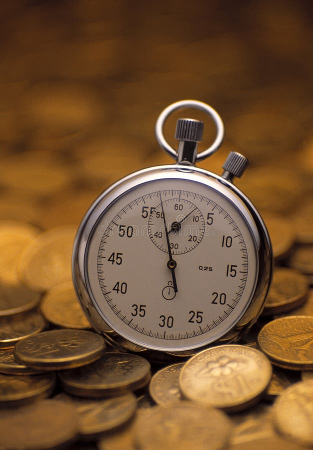 Stop Watch on Heaped of Gold Coins Stock Photo - Image of successful ...