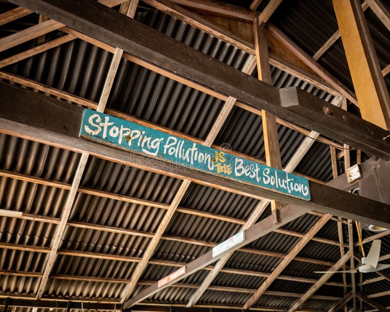 Stopping Pollution is the Best Solution Sign on the Roof Beam Stock ...