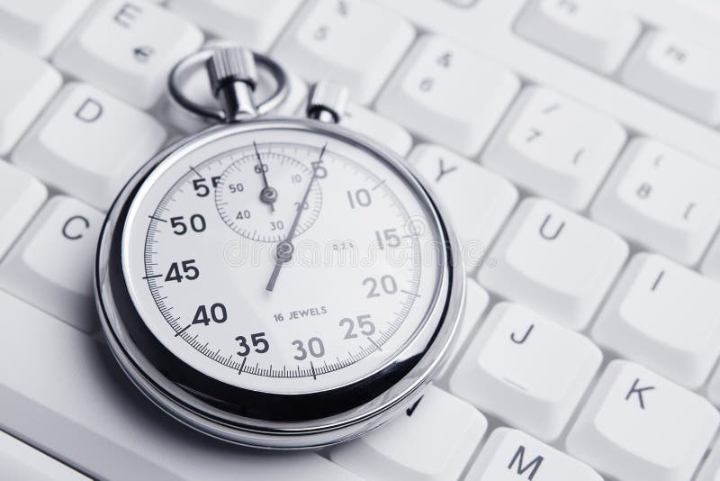 Stopwatch on a Laptop Keyboard Stock Photo - Image of online ...
