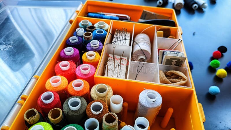 Storage Box with Spools of Multi-colored Threads, Sewing Needles ...