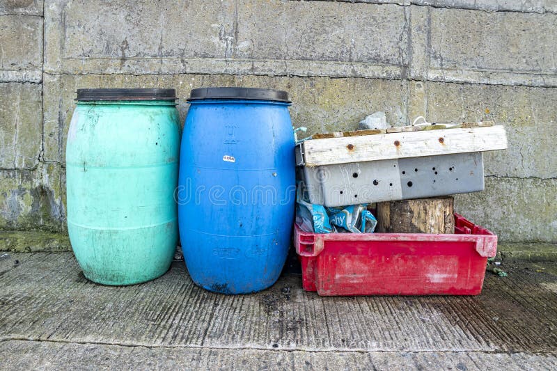 Storage Boxes and Barrels at Irish Harbour in County Donegal Stock ...
