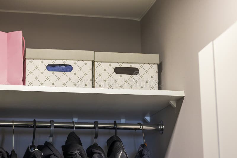 Storage Boxes on the Shelf in the Closet Room. Interior Stock Image ...
