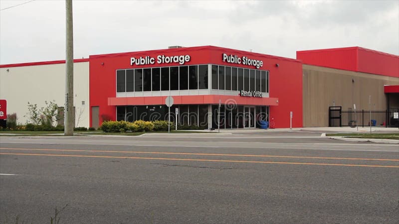Storage Building Public Storage in White Writing on Orange Background ...