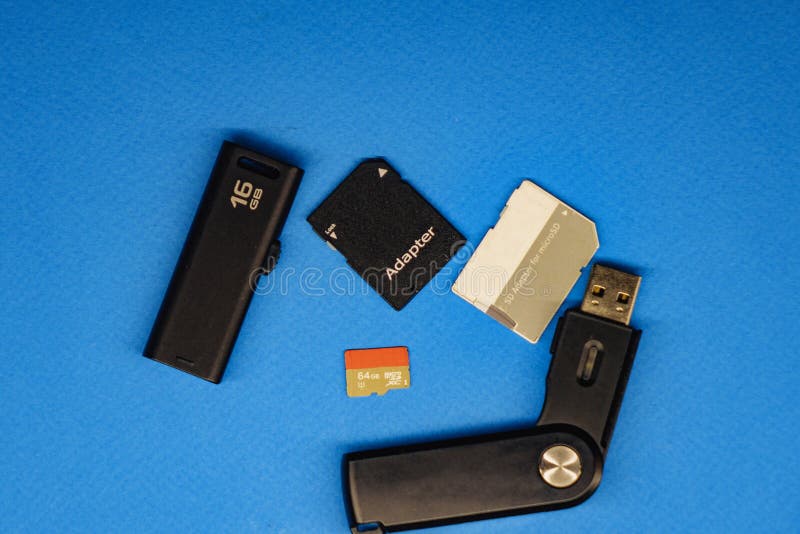 Storage Device, Such As SD Card, USB Flash Drive, on Blue Background ...