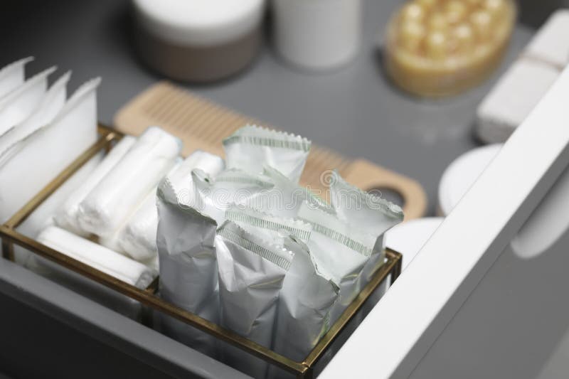Storage of Different Feminine Hygiene Products in Drawer, Closeup Stock ...