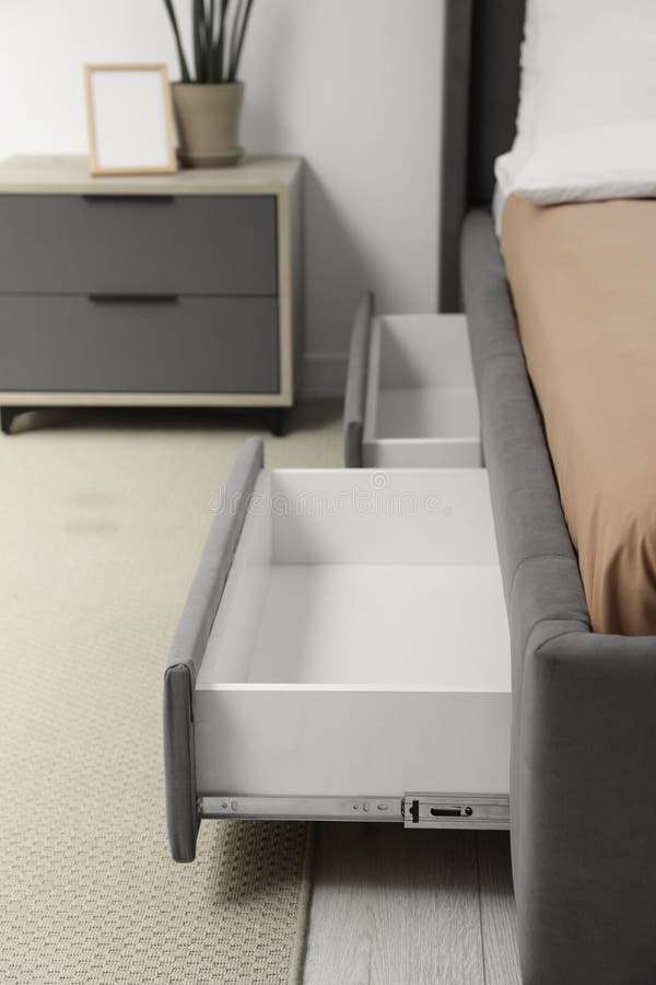 Storage Drawers for Bedding Under Modern Bed in Room Stock Image ...