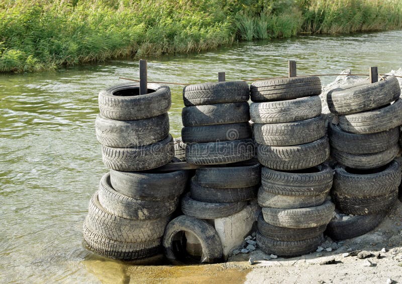 Storage of Old Tires Outdoors Stock Image - Image of reservoir, fencing ...