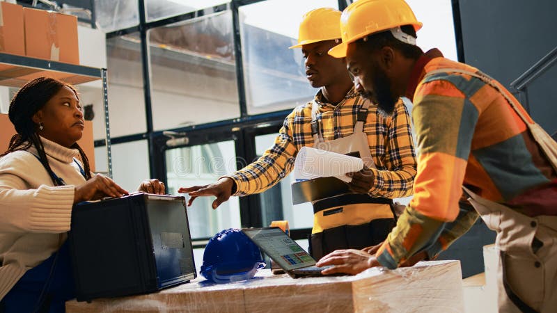 Storage Room Workers Checking Products on Racks Stock Photo - Image of ...