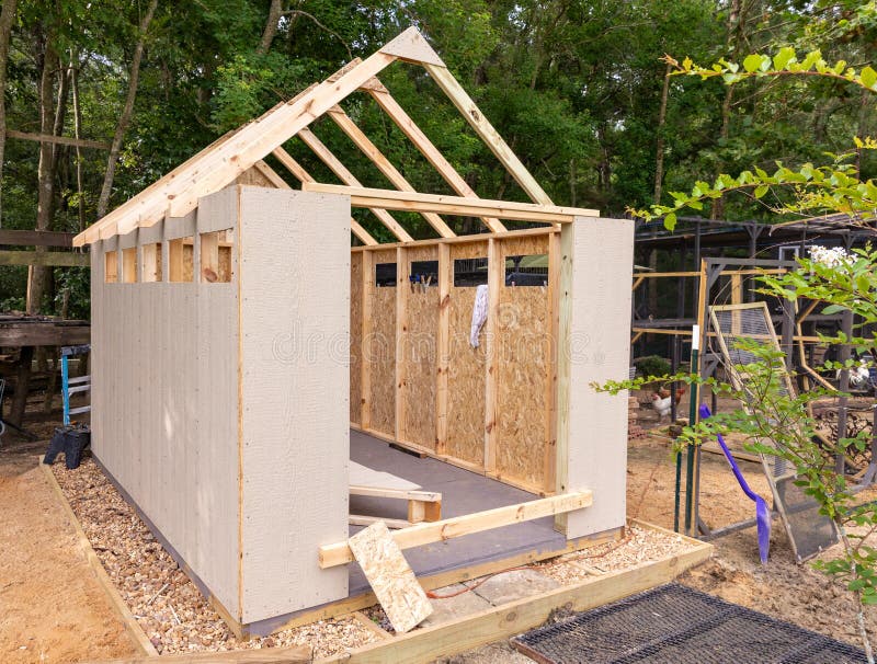 Storage Shed Being Built in Back Yard Stock Photo - Image of yard ...