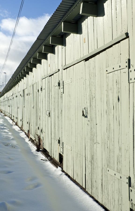 Storage Sheds on the Beach stock image. Image of blue - 1875777