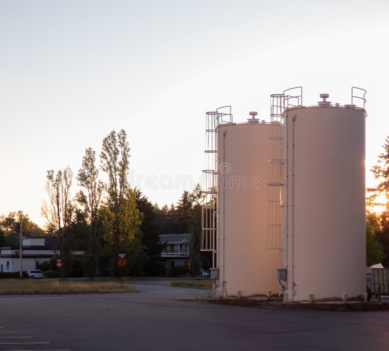 Storage Tanks at an Air Force Base Stock Photo - Image of fuel, trees ...