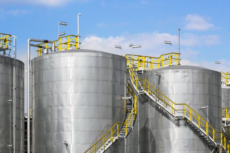 Refinery storage tanks stock image. Image of construction - 18247245
