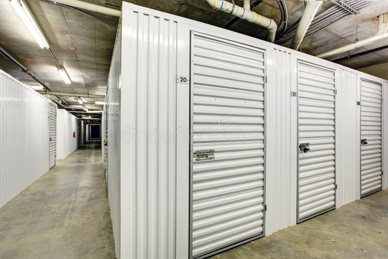 Storage Units in the Basement for Apartment Building Stock Photo ...