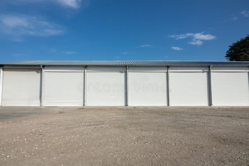 Storage Units with Roller Shutter Doors in Industrial Area Stock Image ...
