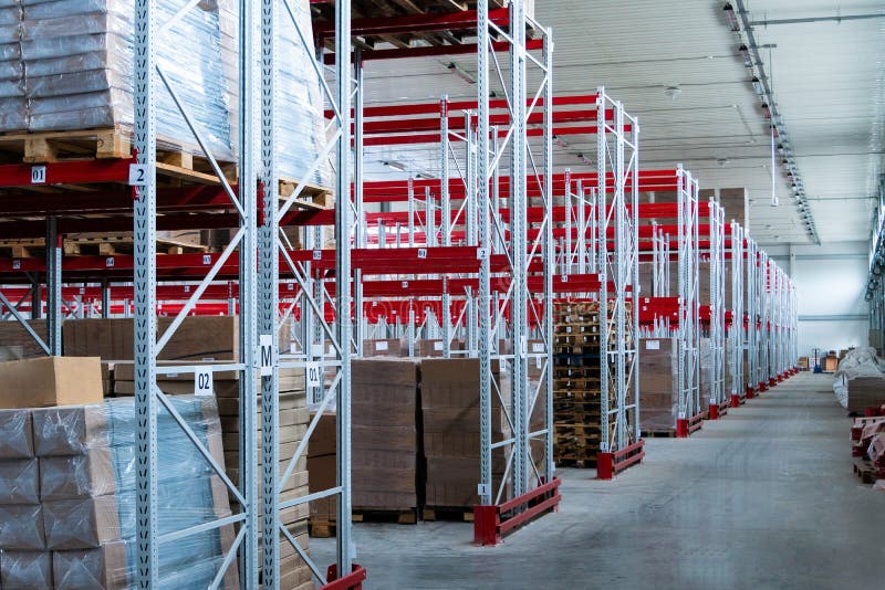 Storage Warehouse and Racks on Which There are Cardboard Boxes with ...