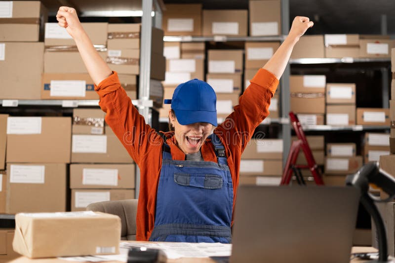 Storage Worker Celebrating Victory and Success Sitting in Warehouse ...